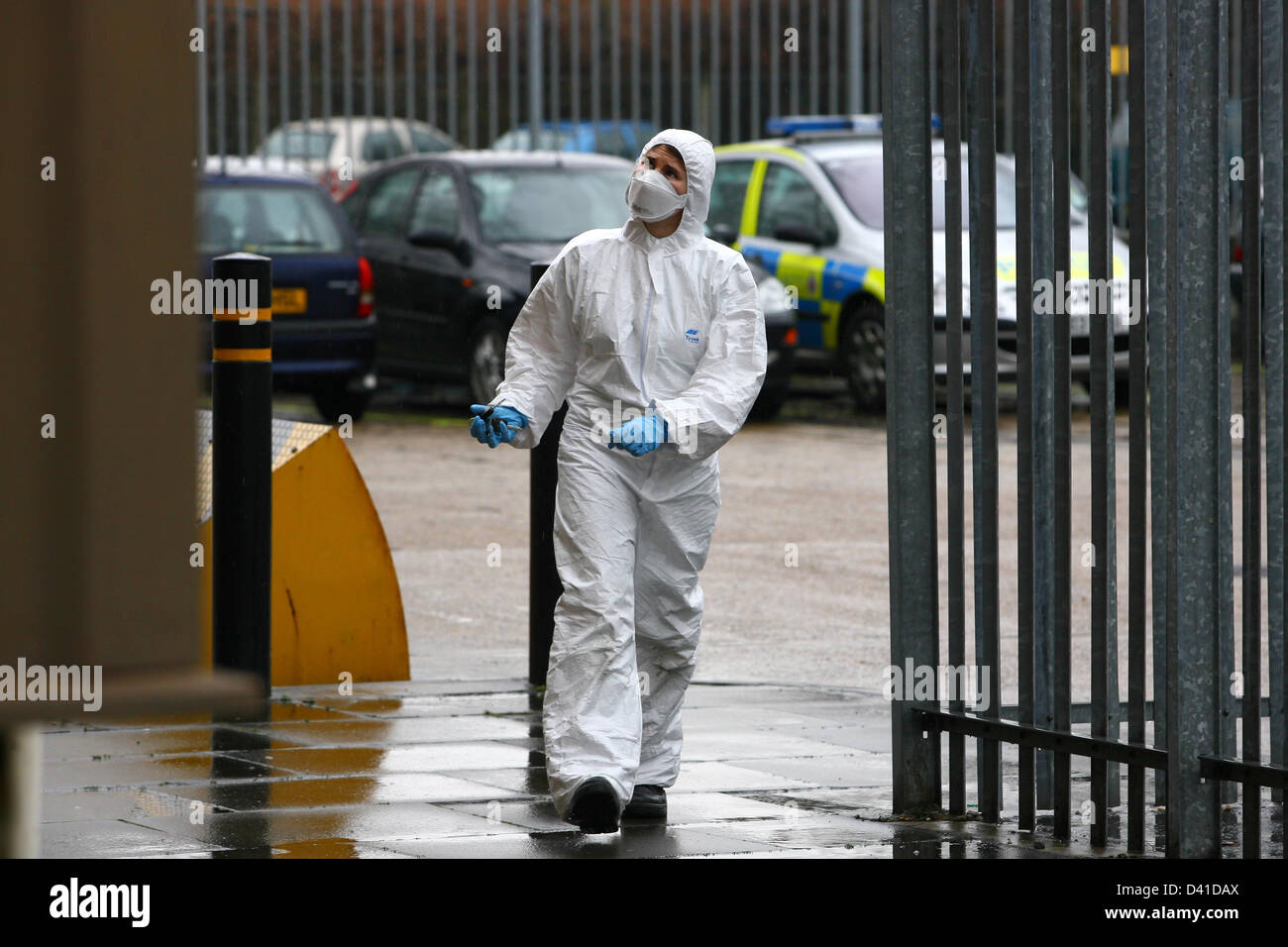 Police forensics officers at the scene of an armed robbery at the ...