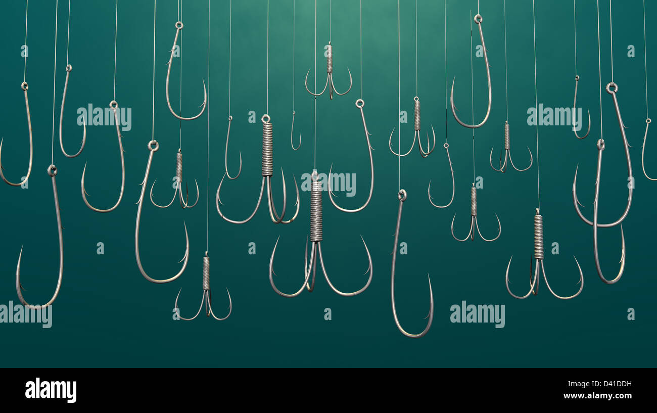 An array of fishing hooks in various sizes and shapes dangling ...