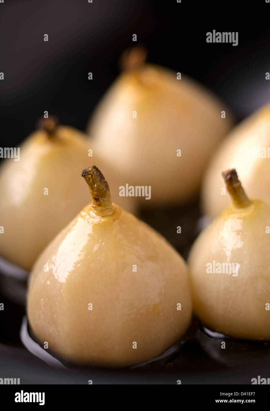 Poached baby pears Stock Photo - Alamy