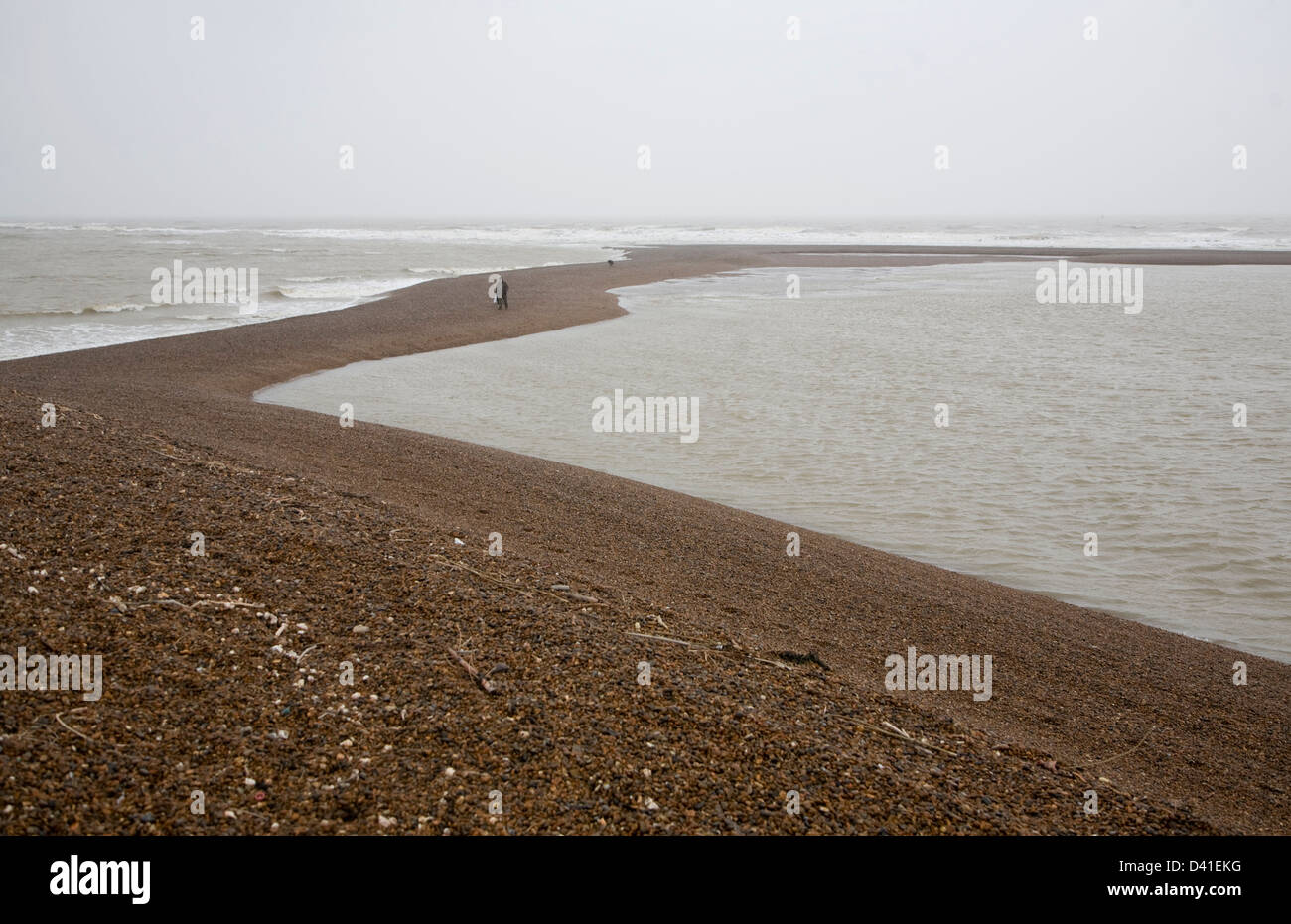 Temporary shingle spit perpendicular to coast formed by strong ...
