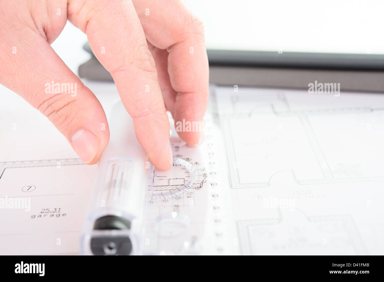 Architect does measuring on a draft Stock Photo - Alamy