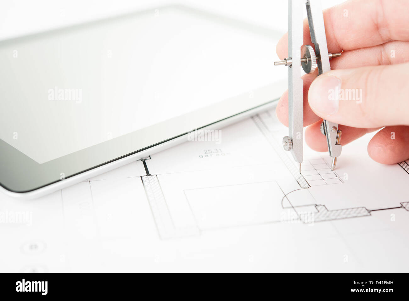 Architect does measuring on a draft Stock Photo - Alamy