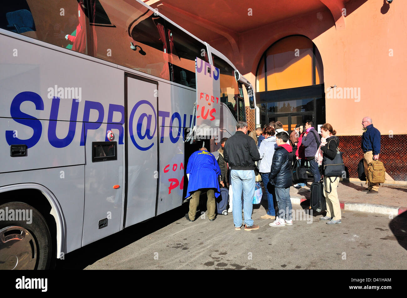 Passengers boarding the Supratours bus at their bus depot near ...