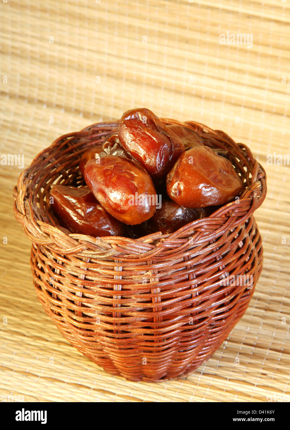Dates in the bamboo jar Stock Photo - Alamy
