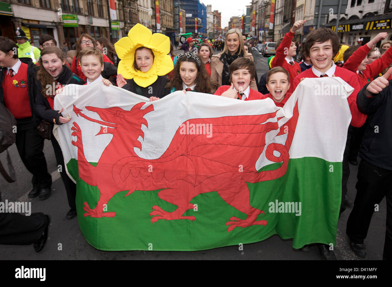 Daffodil,hat,wearing,and Welsh Dragon,flag,Cardiff, Wales, UK. 1st ...