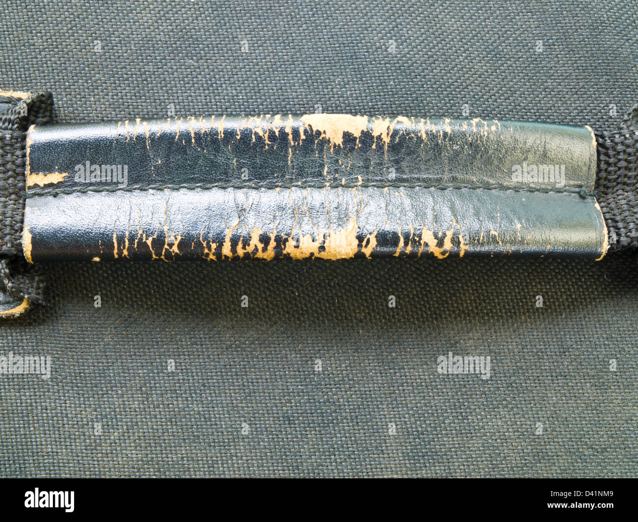 Old black leather handle on black fabric texture as background Stock ...