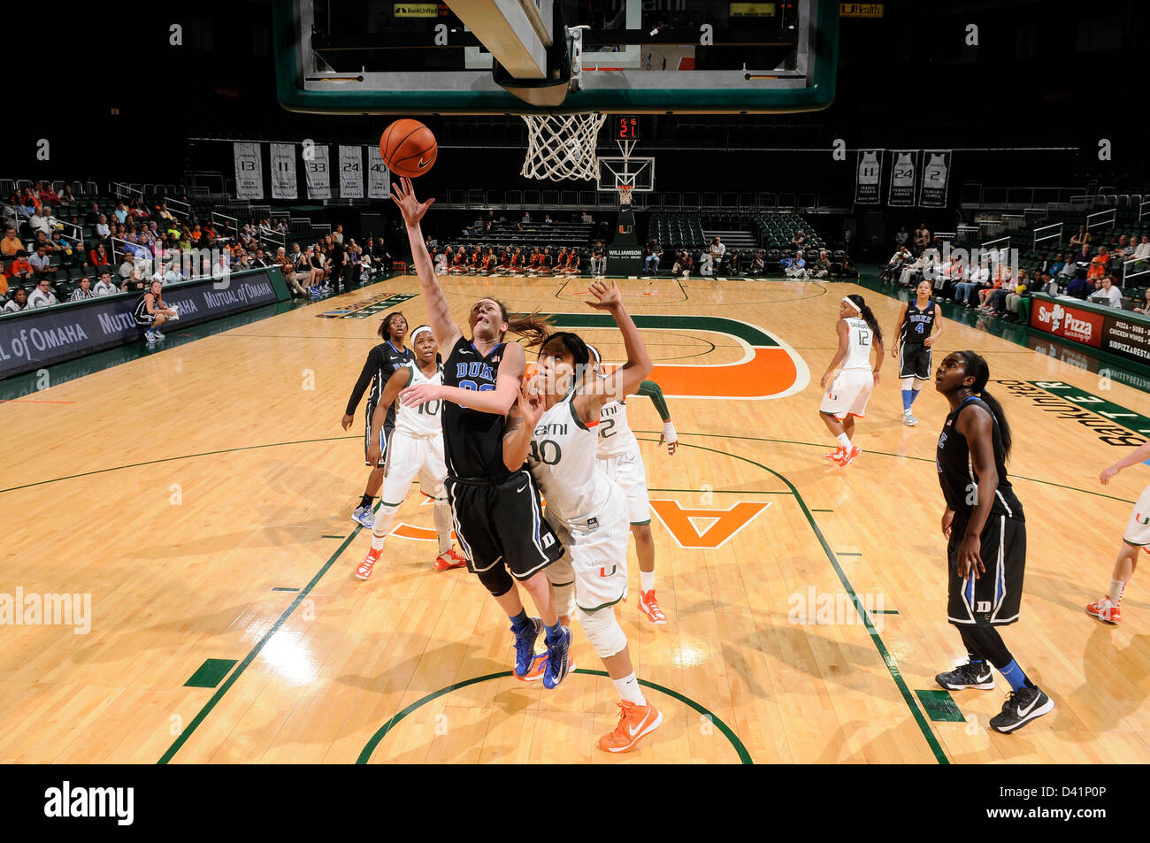 Haley Peters #33 of Duke shoots over Shawnice Wilson #40 of Miami ...