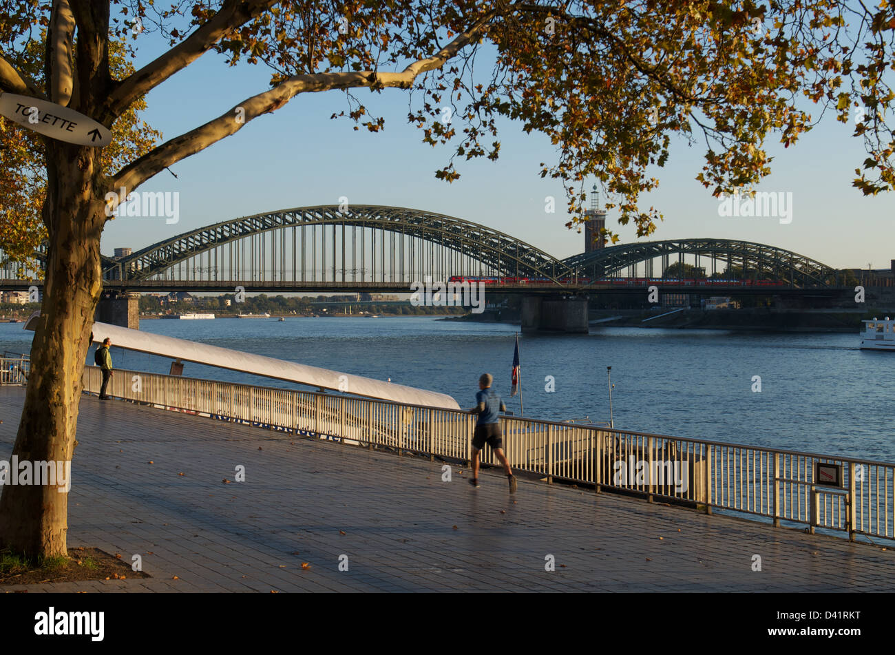 Cologne Railway Bridge from the west bank of the Rhine early morning ...