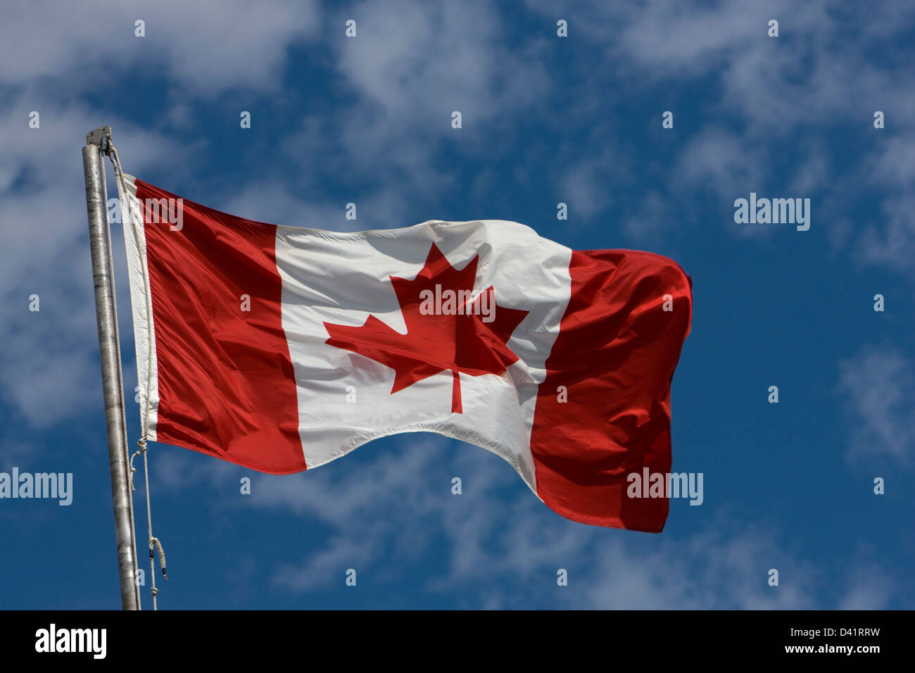 The Canadian maple leaf red and white flag flying over Rustico in ...