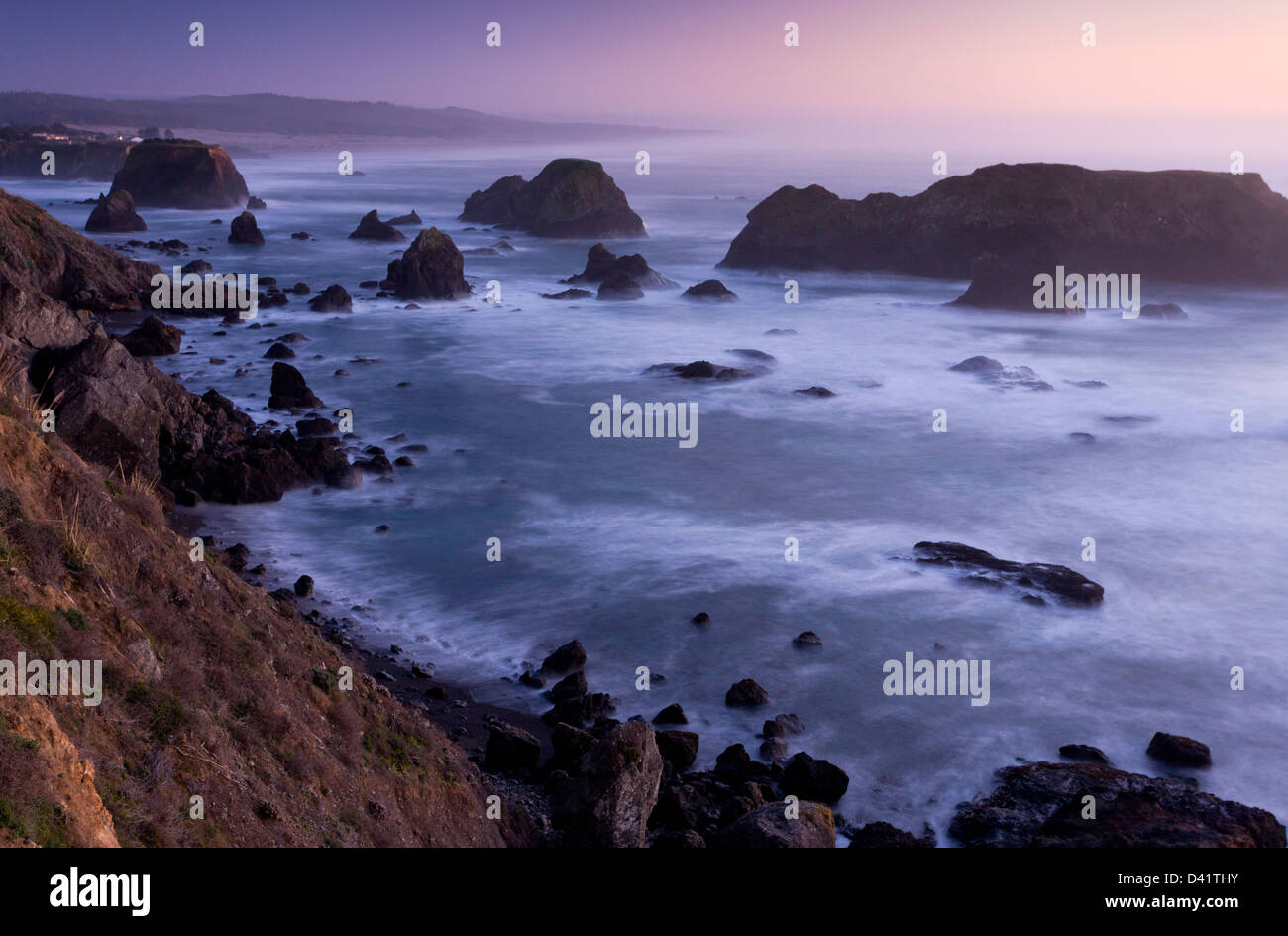 Offshore rocks in the Pacific at sunset, at Westport, on the coast of ...