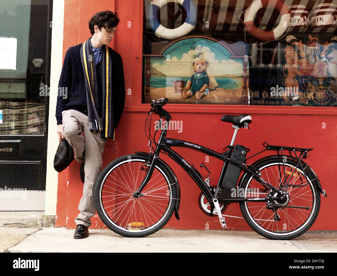 Man stands with broken electric bike, London, UK Stock Photo - Alamy