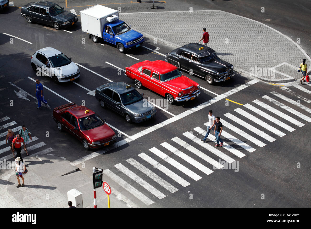 Old American Cars Stopped At Traffic Lights In Downtown Havana Cuba ...