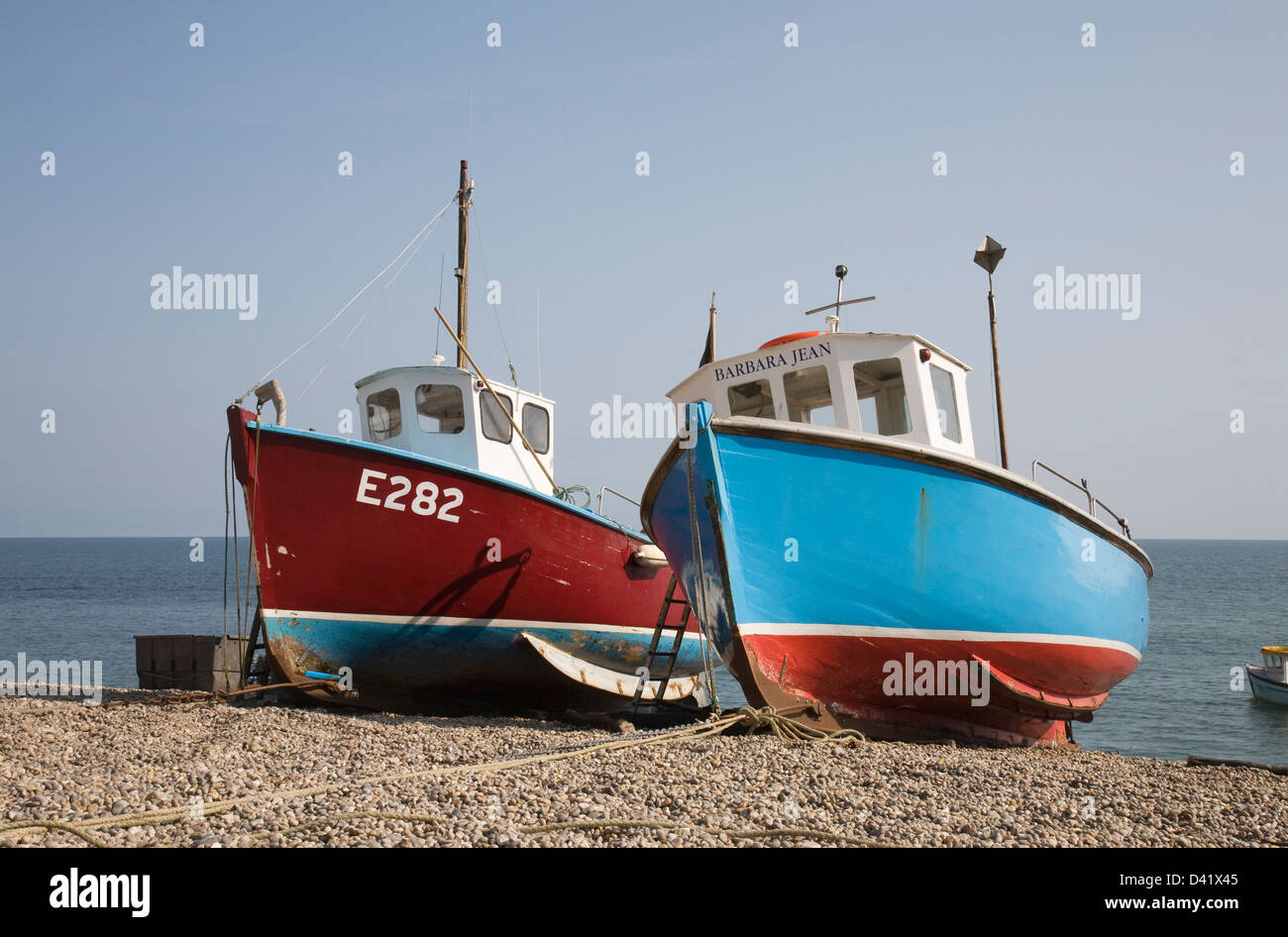 Two fishing boats on Beer beach in Devon, England Stock Photo - Alamy