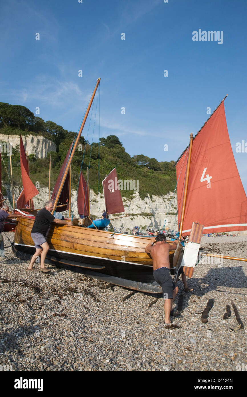 Beer Luggers on Beer beach making ready for sail, Devon, England Stock ...