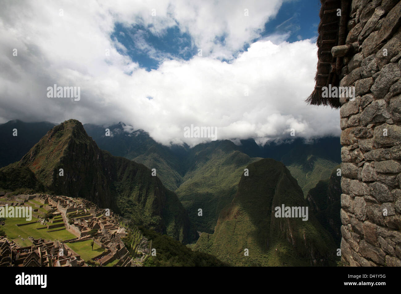 Machu Picchu Inca ruins with Huayna Picchu mountain in the background ...
