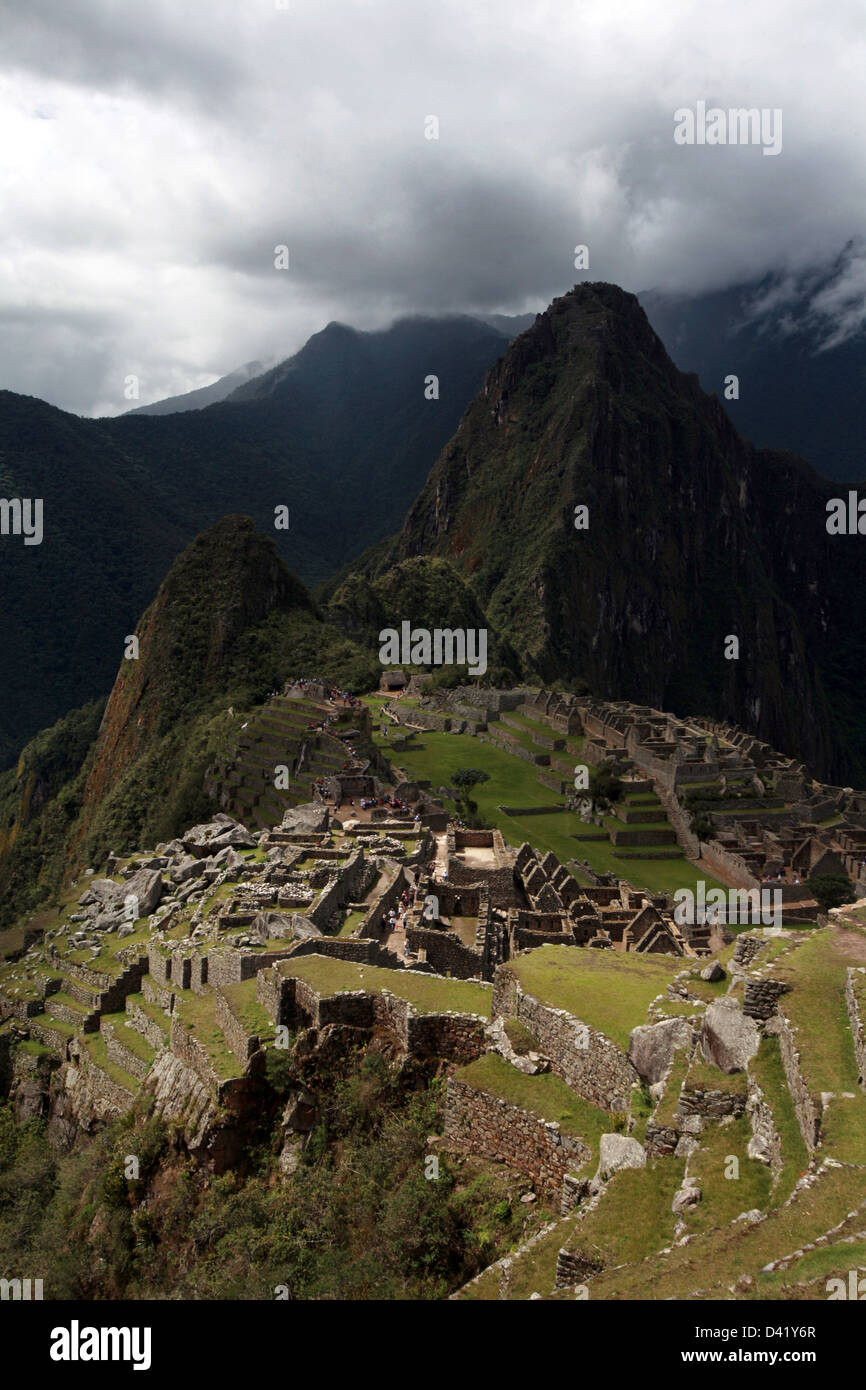 Machu Picchu Inca ruins with Huayna Picchu mountain in the background ...