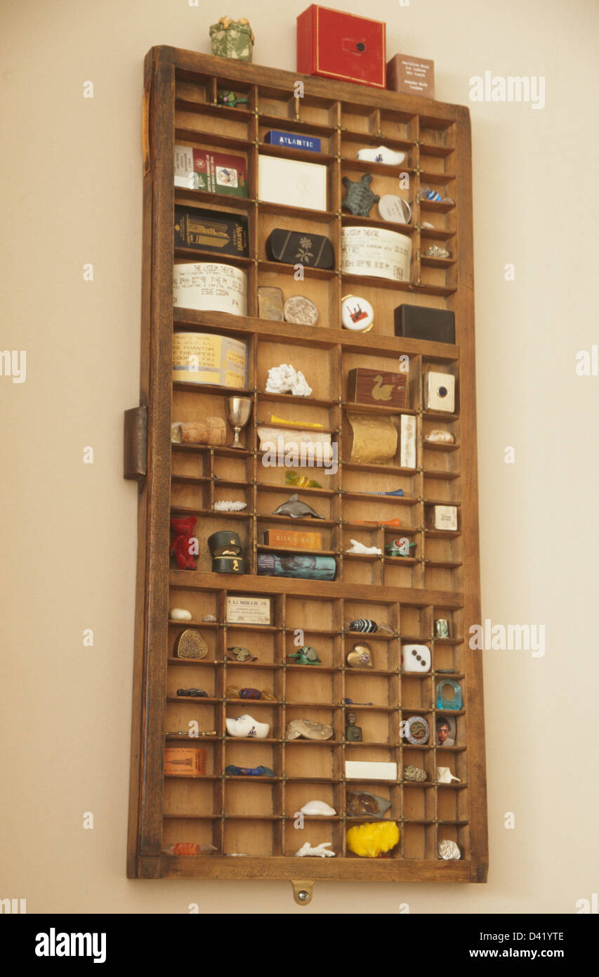 Collection of miniature objects on old wooden print tray Stock Photo ...