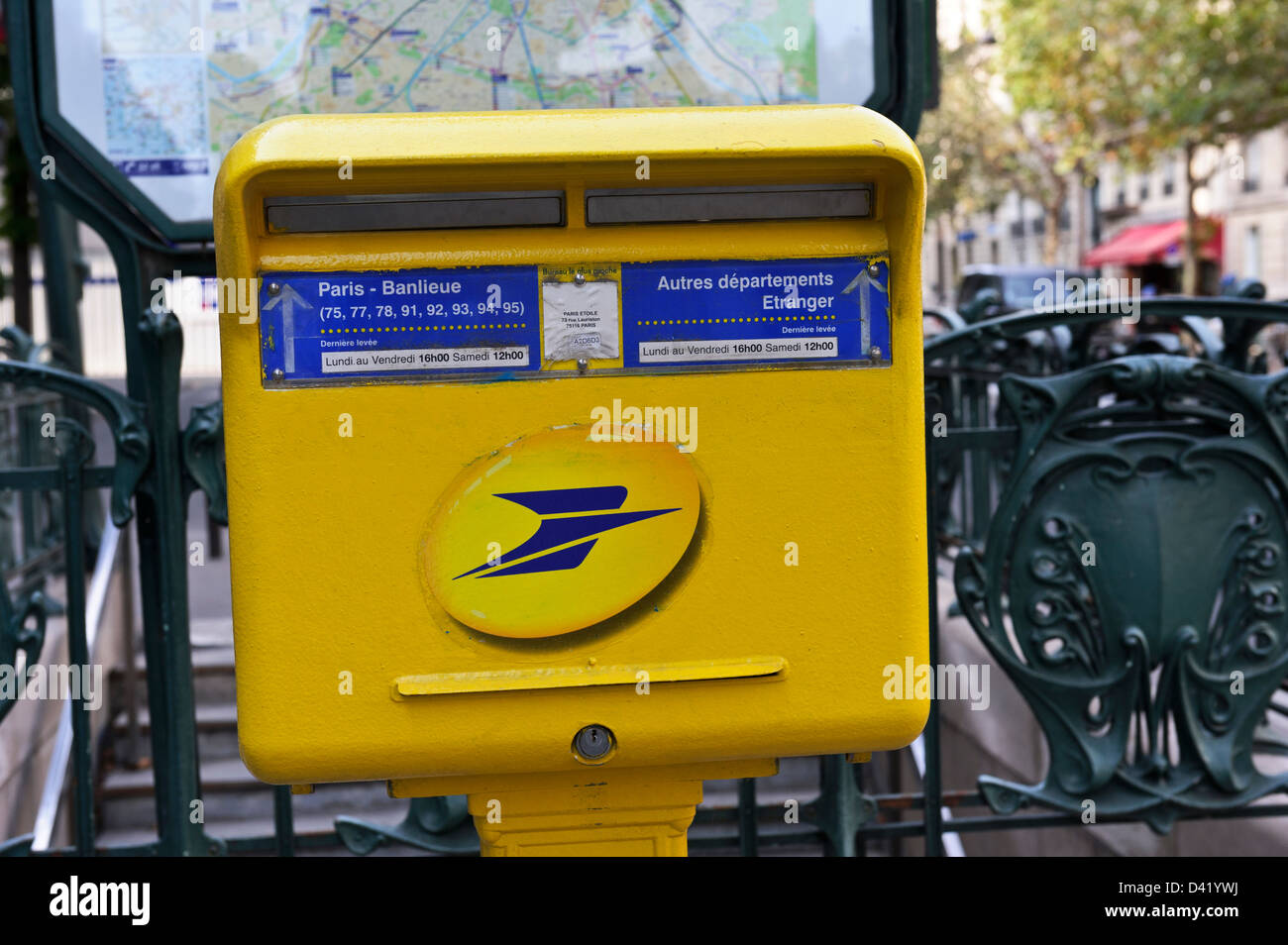 Yellow letterbox in Paris, France Stock Photo - Alamy