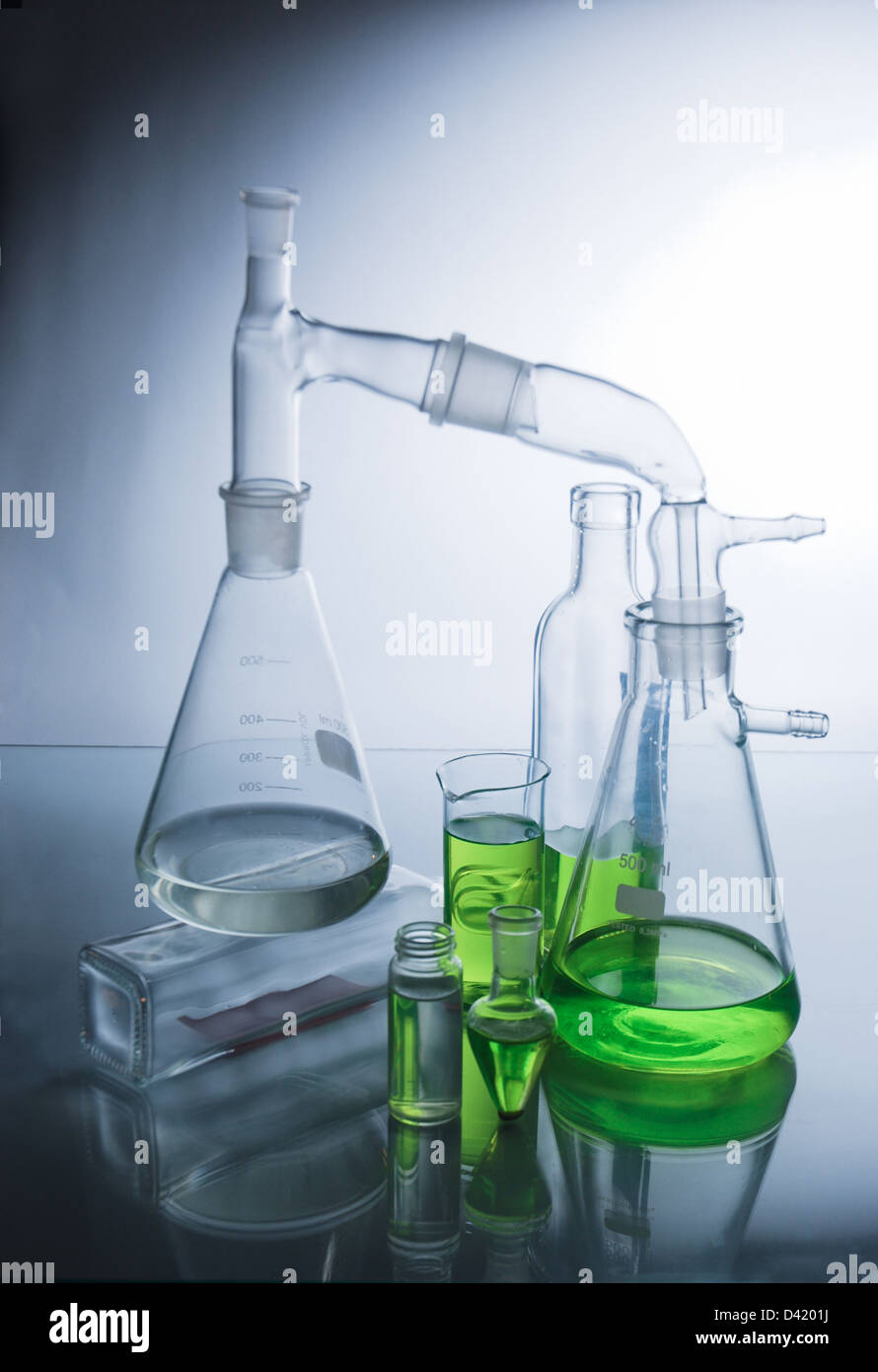 Laboratory glassware over white background Stock Photo - Alamy