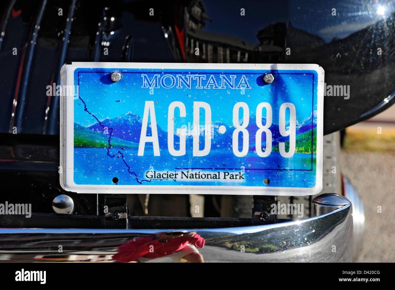 License Plate Red Touring Car Glacier National Park Montana MT US Stock ...