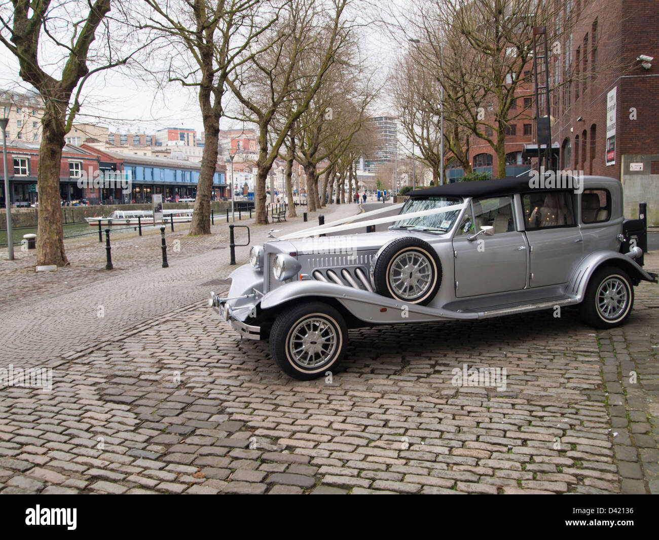 A wedding car on Bordeaux Quay, Bristol Harbour. A four door Beaford ...