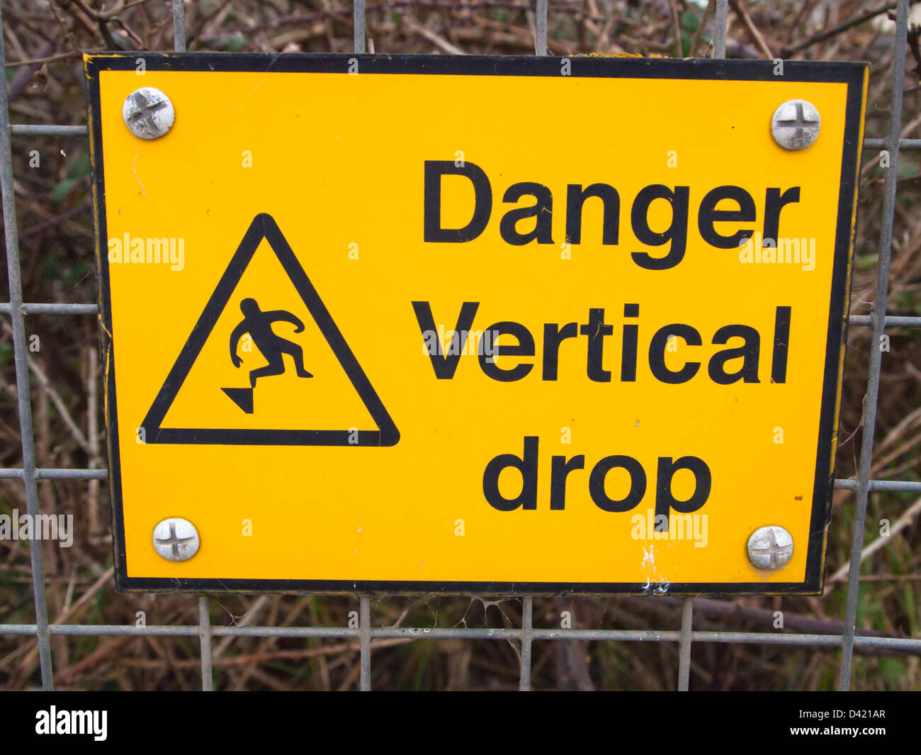 A danger Vertical sign, in yellow Stock Photo - Alamy