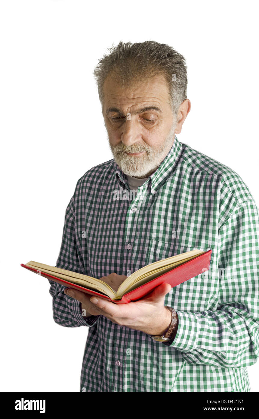 Confident business man reading a book isolated on white background ...