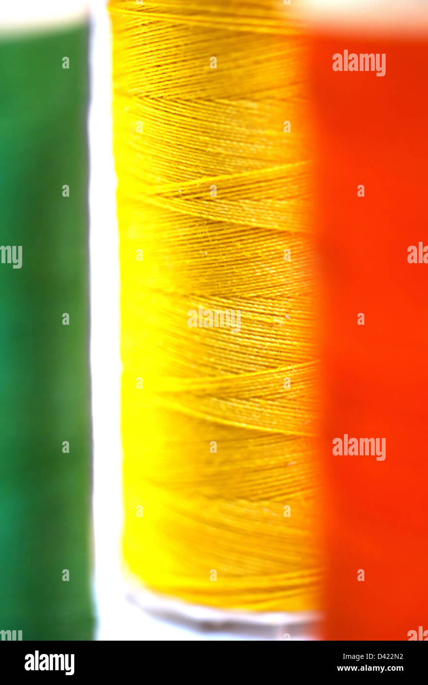 Colourful bobbins of thread Stock Photo - Alamy