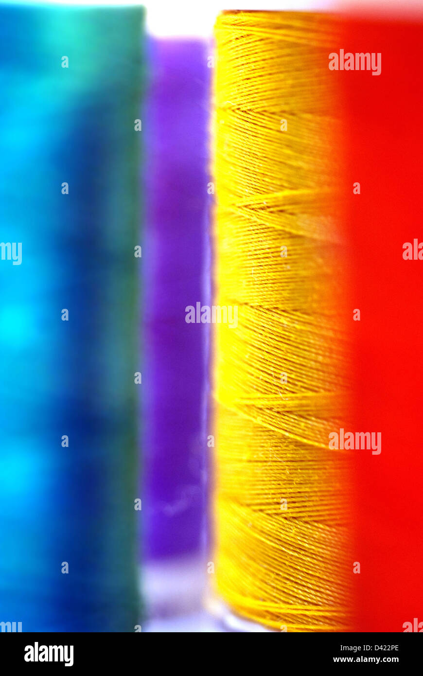 Colourful bobbins of thread Stock Photo - Alamy