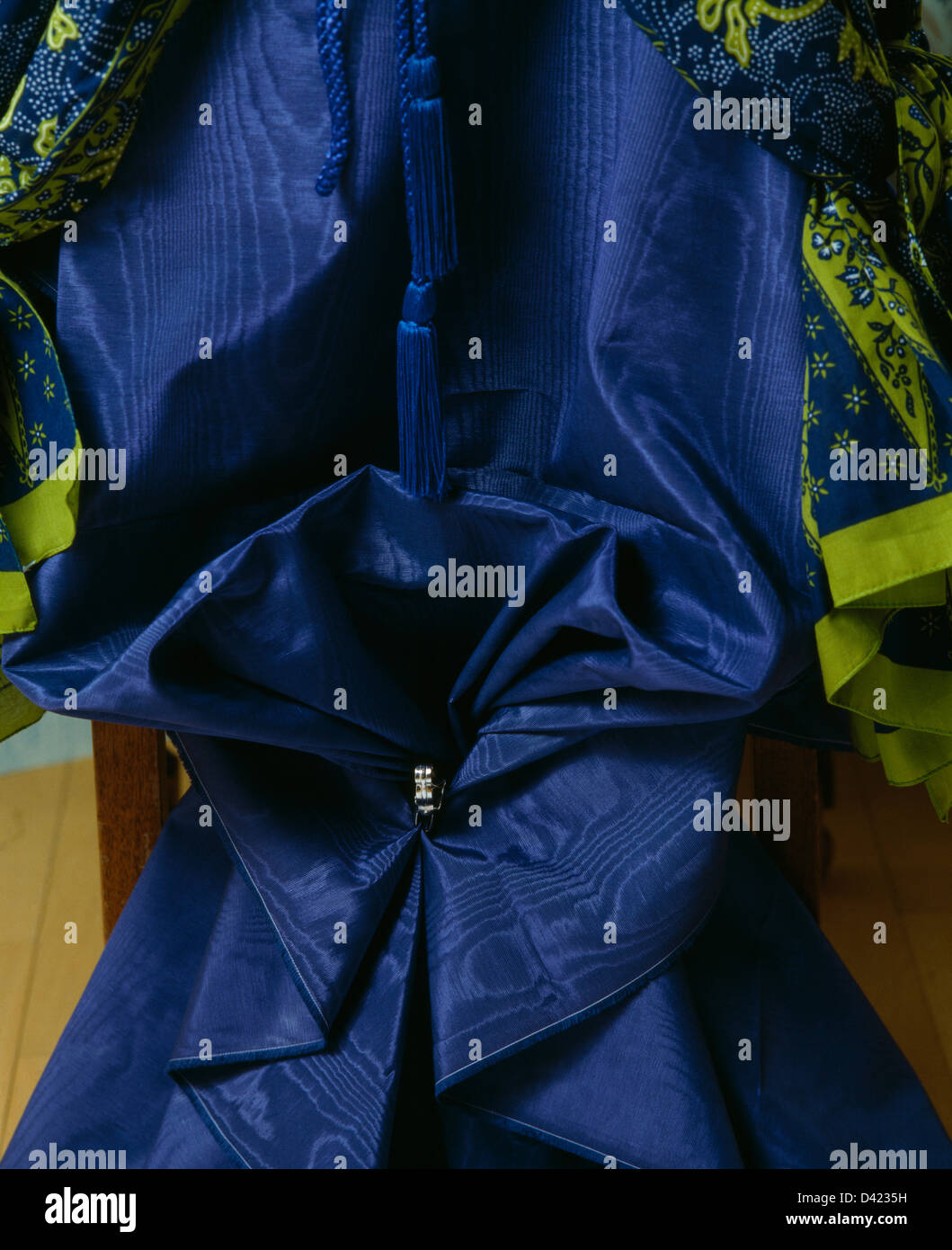 Close-up of blue moire silk trimming on loose cover Stock Photo - Alamy