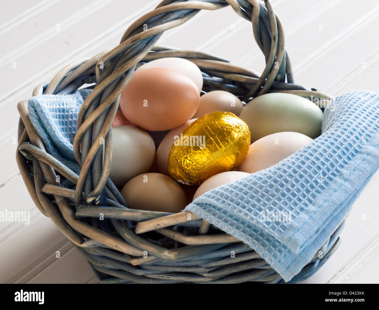 Fresh multi-color farm eggs on the table Stock Photo - Alamy