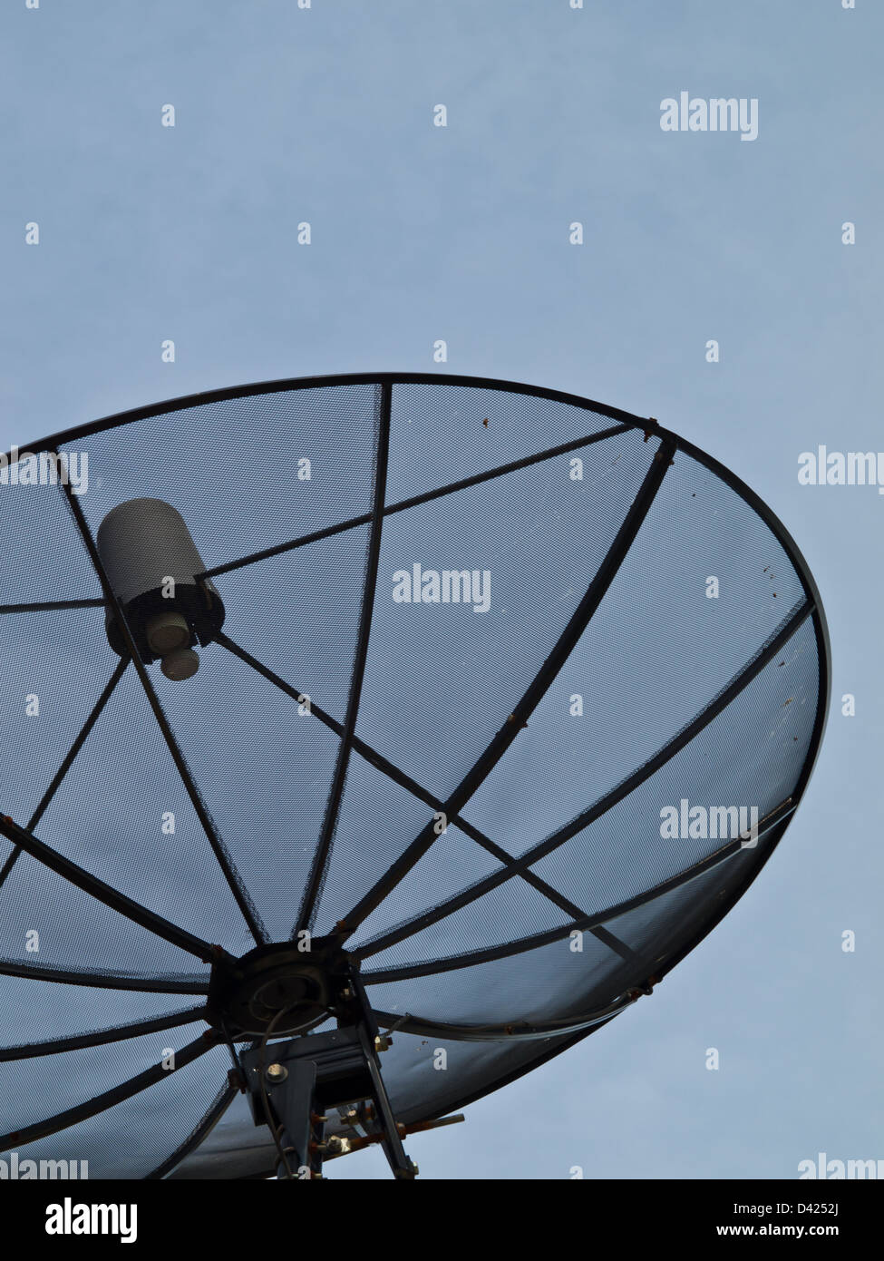 Part of satellite dish on a blue sky background Stock Photo - Alamy