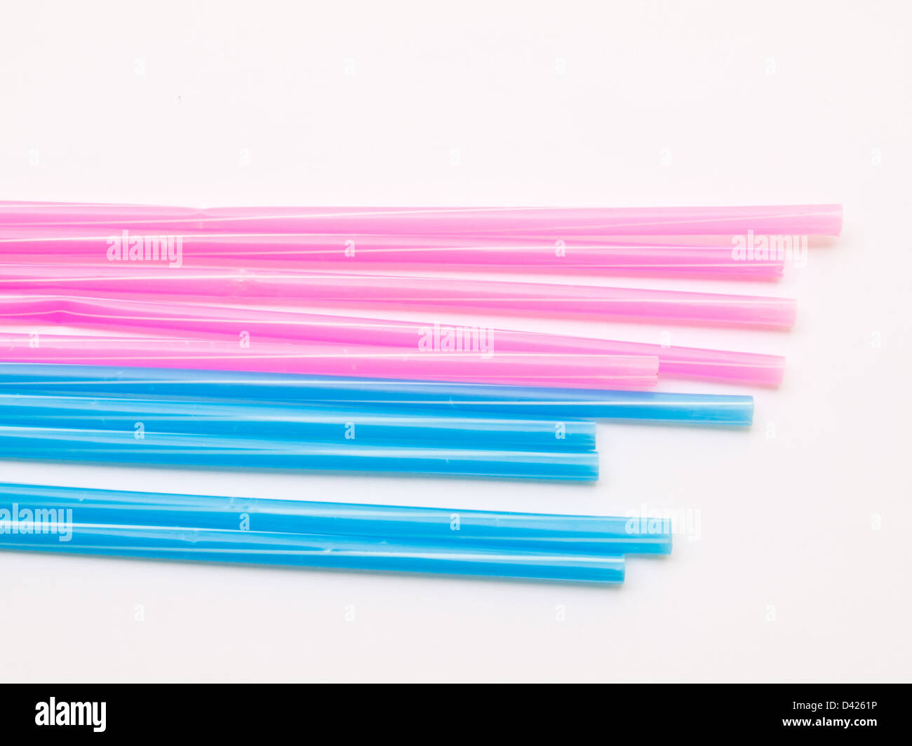 Light blue straws isolated on white back ground Stock Photo - Alamy
