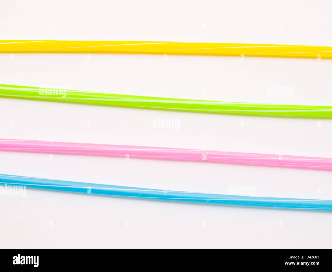 Colorful straws isolated on white background Stock Photo - Alamy