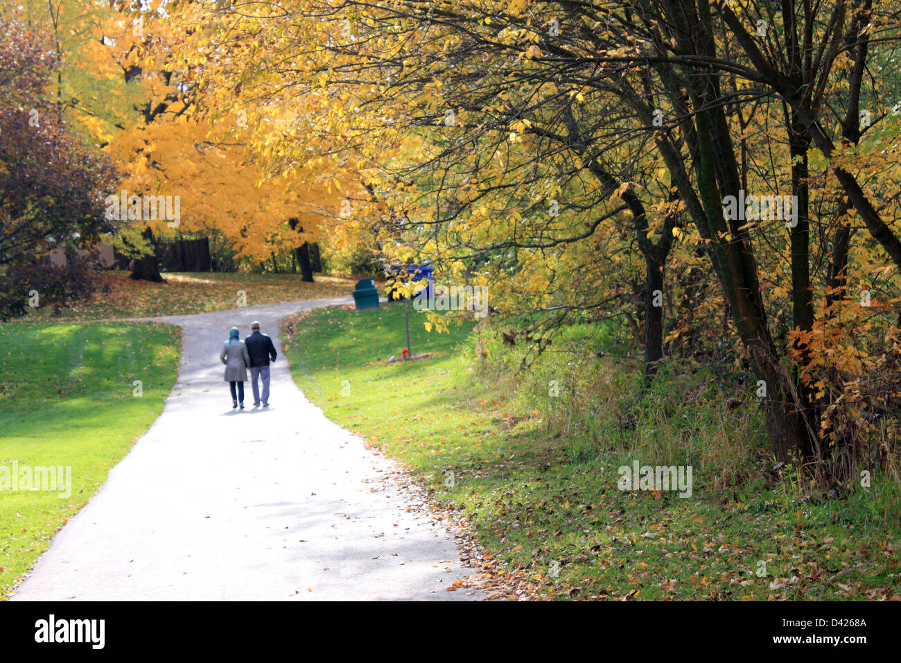 Walking Side by Side Stock Photo - Alamy