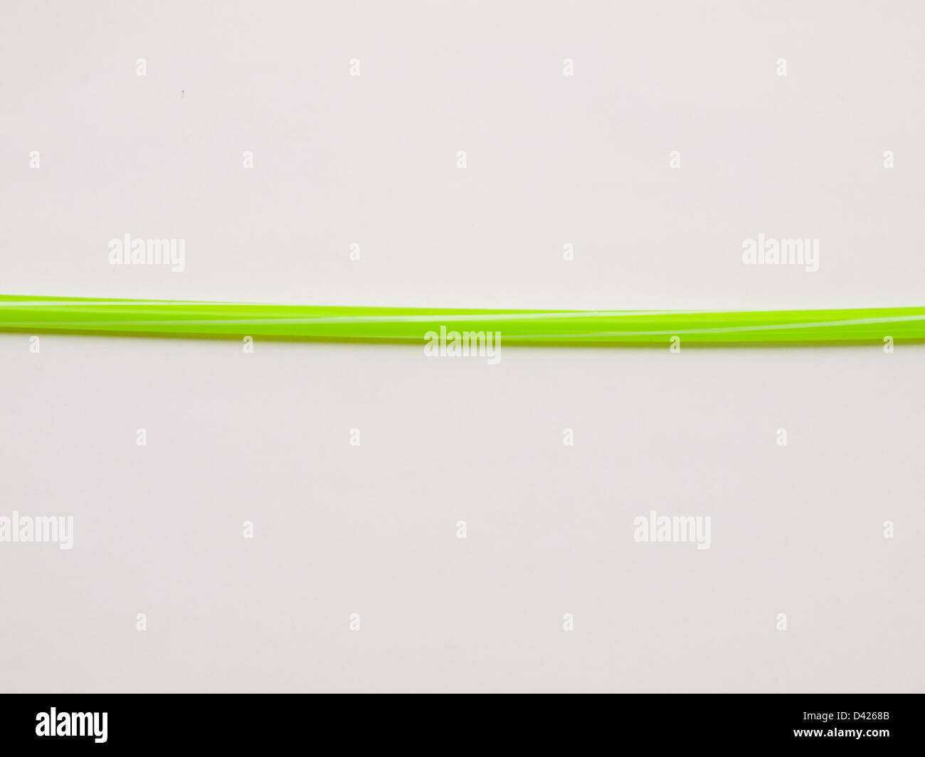Green straw isolated on white background Stock Photo - Alamy