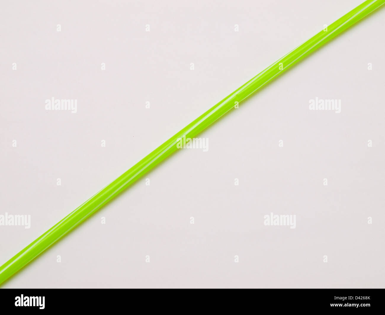 Green straw isolated on white background Stock Photo - Alamy