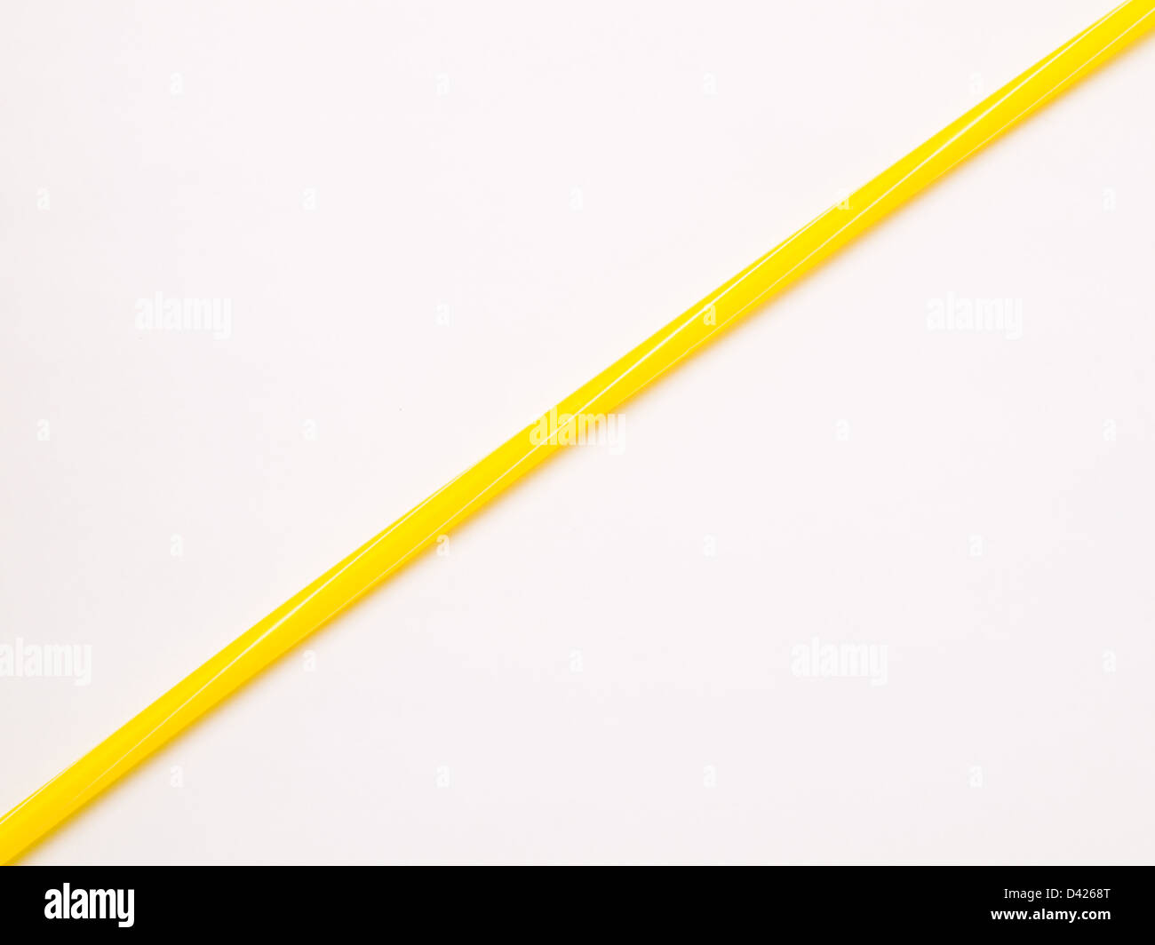 Yellow straw isolated on white background Stock Photo - Alamy