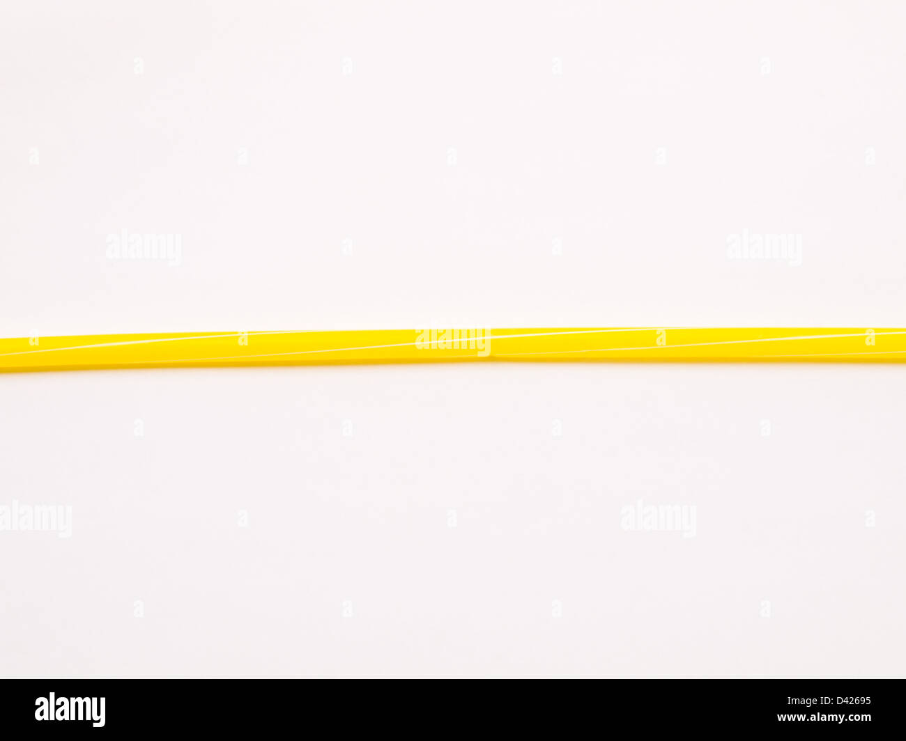 Yellow straw isolated on white background Stock Photo - Alamy