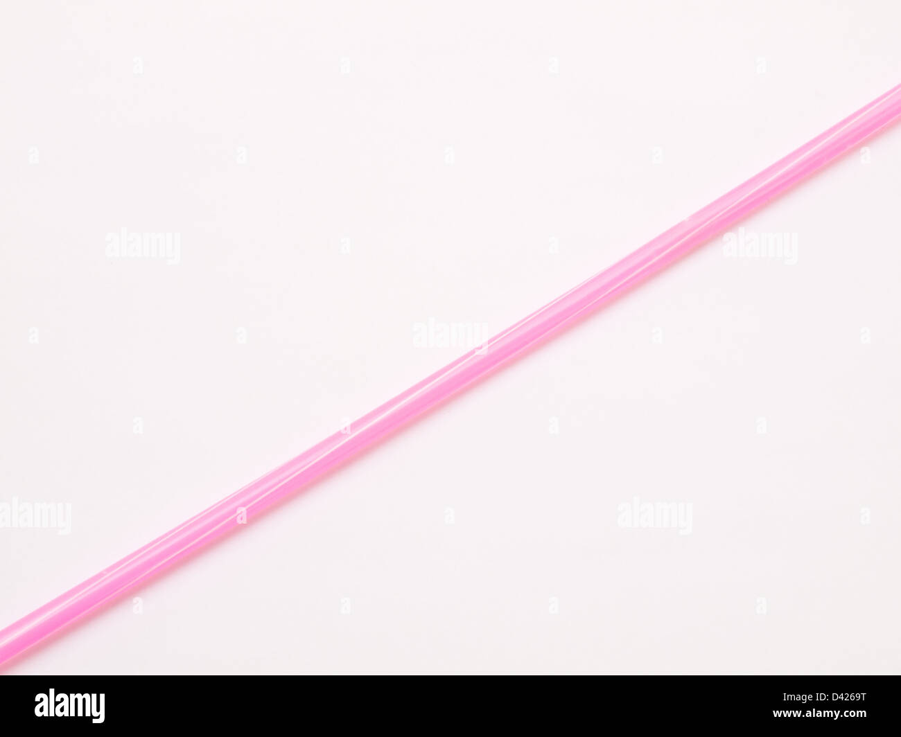 Pink straw isolated on white background Stock Photo - Alamy