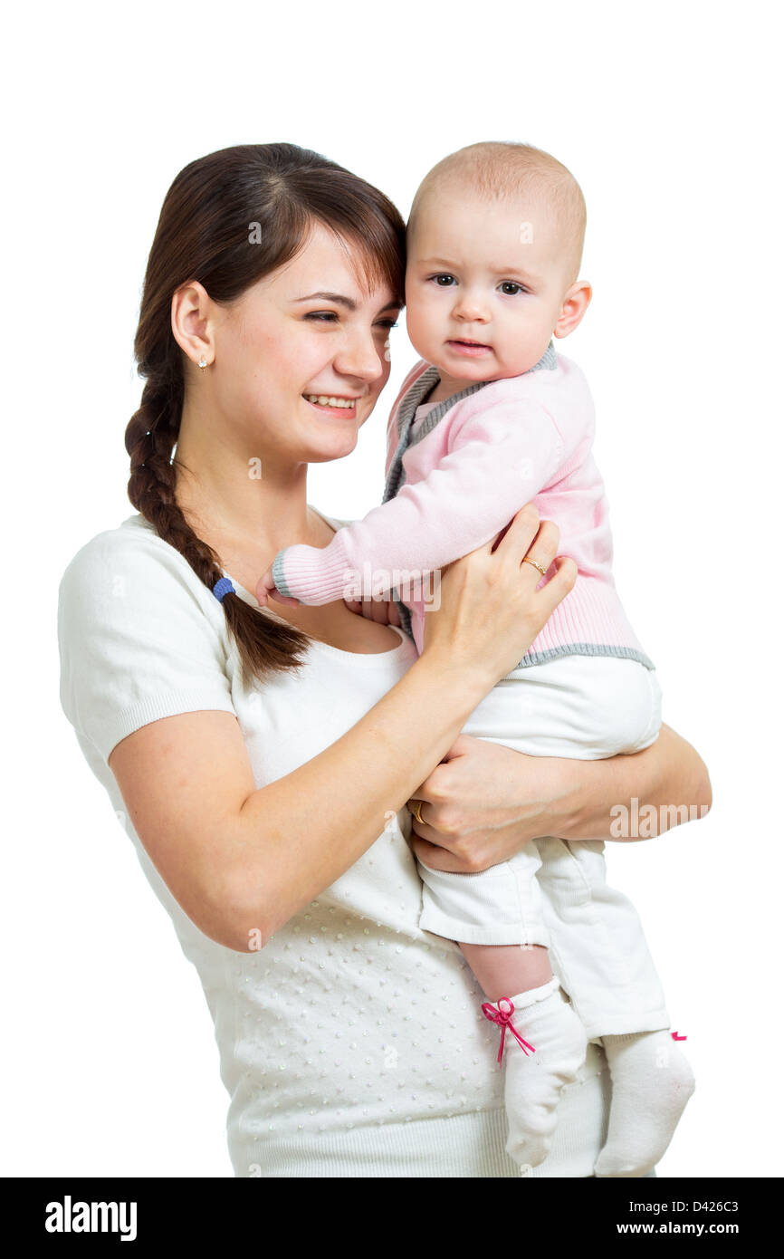Happy mother holding her baby girl isolated Stock Photo - Alamy
