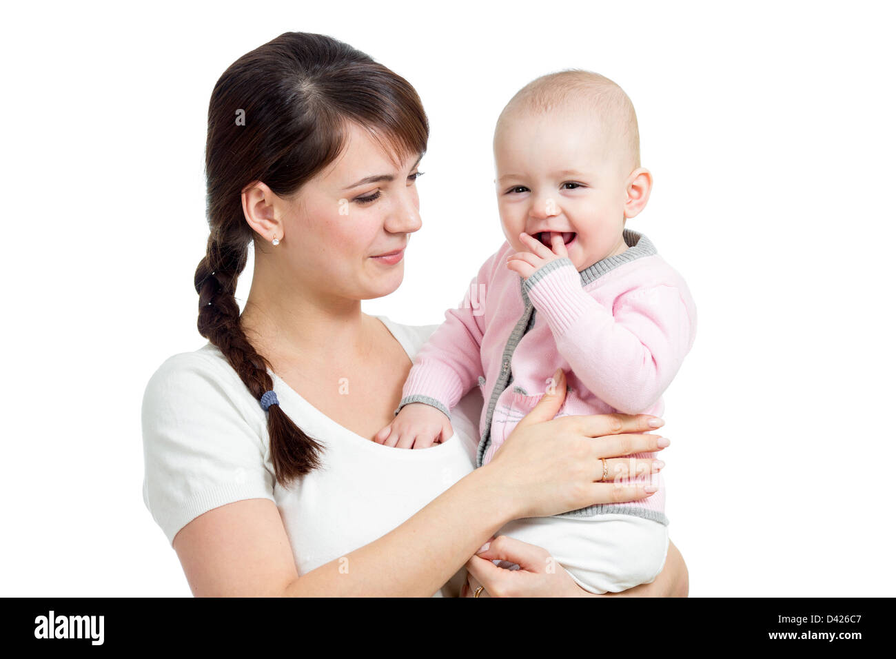 Happy mother looking at her baby girl isolated Stock Photo - Alamy