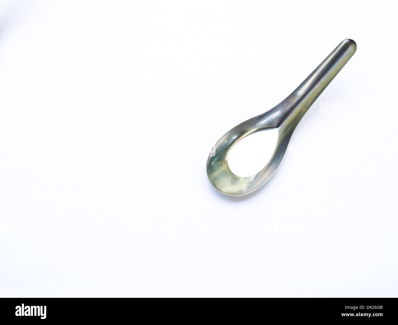 Used stainless steel spoons isolated on white background Stock Photo ...
