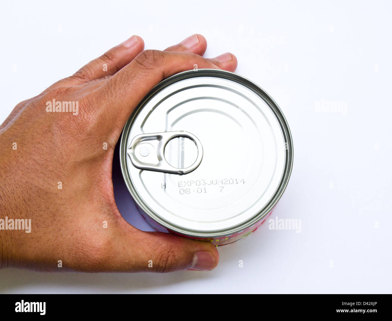 Food can in hand isolated on white background Stock Photo - Alamy