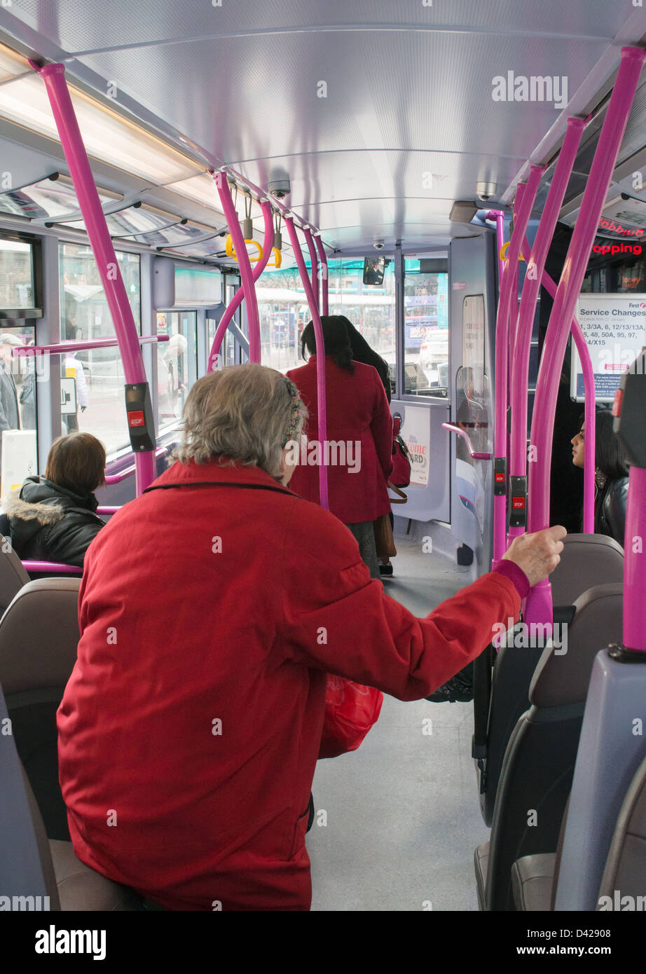 Interior of bus with female passengers preparing to leave, England UK ...