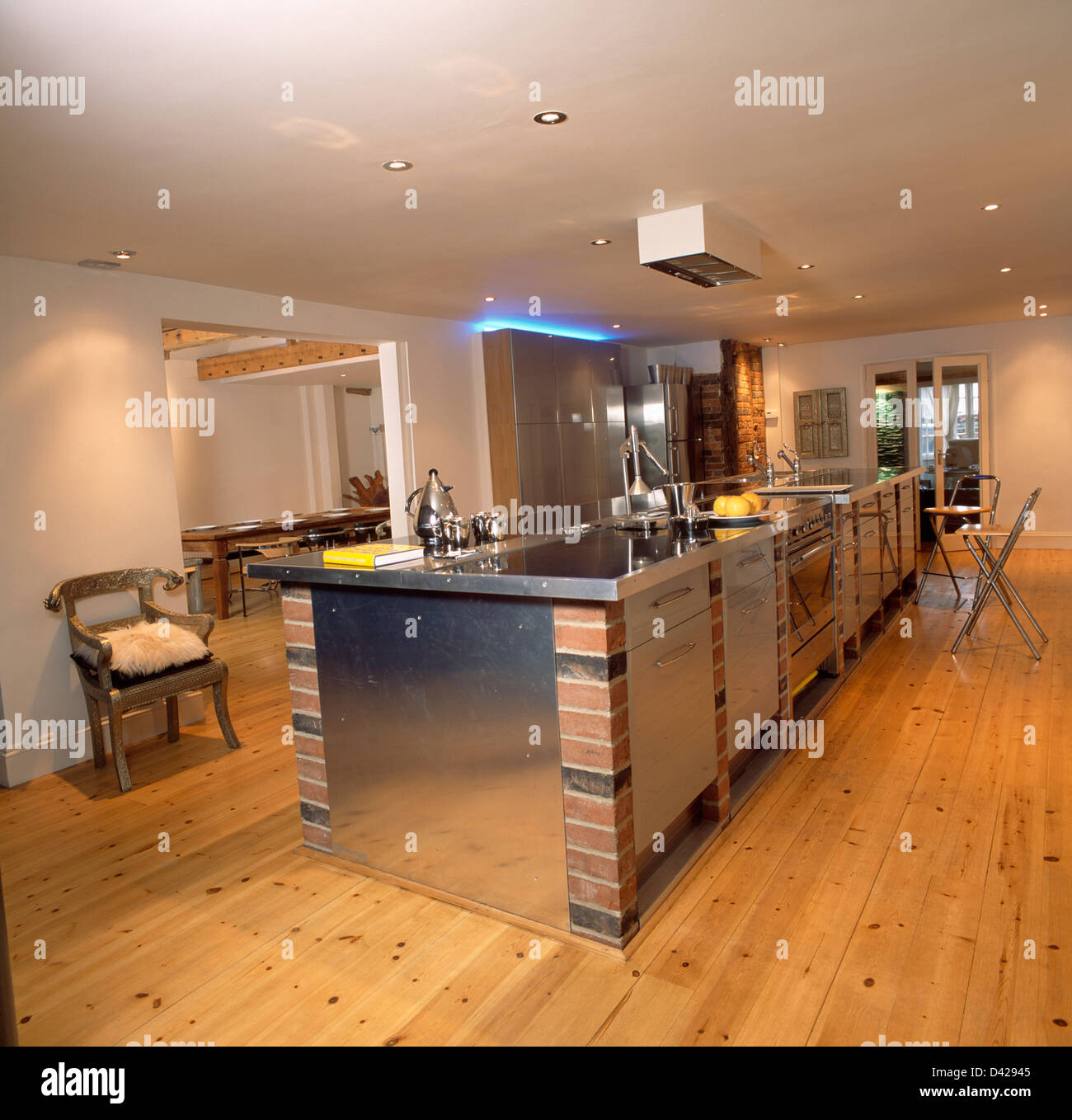 Built in appliances in brick and steel central unit in modern country ...