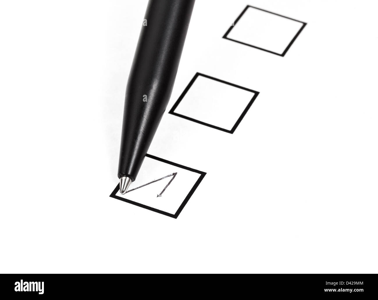 tick in black square box by black ballpoint pen Stock Photo - Alamy