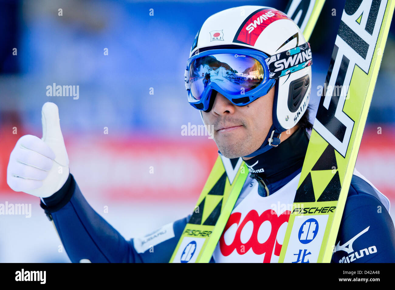 Akito Watabe of Japan reacts after his jump of the Nordic Combined team ...
