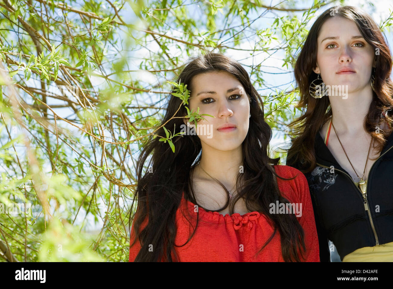 Two women friends portrait in spring Stock Photo - Alamy