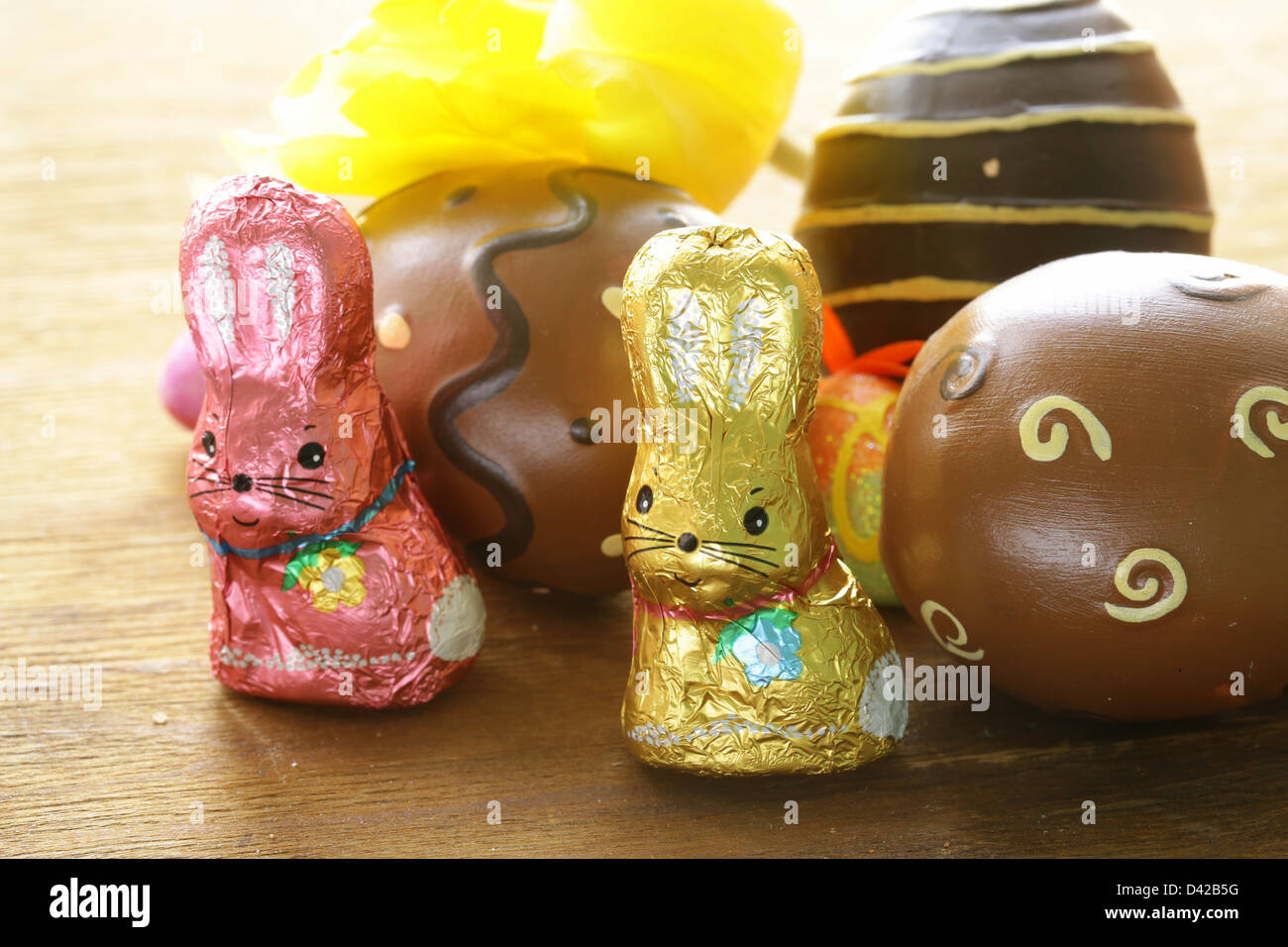 chocolate Easter bunny (sweets) with tulips Stock Photo - Alamy